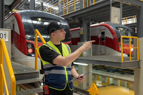 Portrait of Engineer train Inspect the Railway Electrification System ...