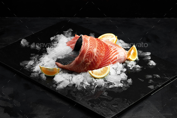 Lightly salted trout. Fresh fish fillet with culinary ingredients ...