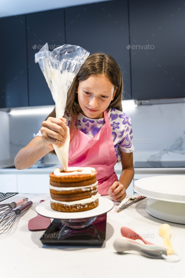 Mother and daughter bonding over baking activities. Stock Photo by ...