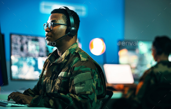 Army, control room and man on computer in office, data center and monitor for technical support ...