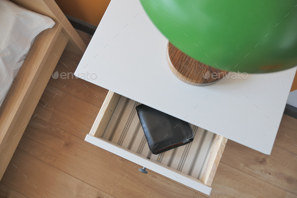 Wallet in the drawer at the home. Stock Photo by towfiqu98 | PhotoDune