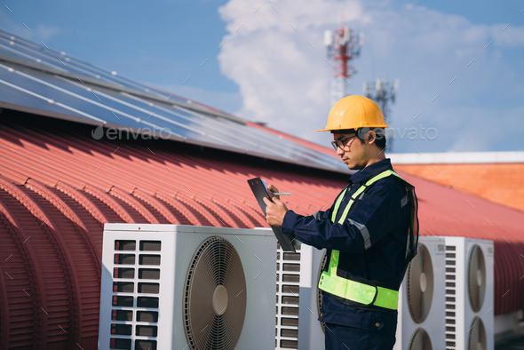 Engineers is checking the air conditioning cooling system of a major ...