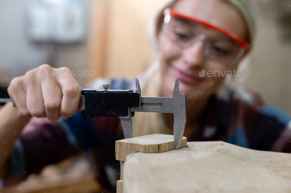 Close up vernier calipers. Worker carpenter or craftsman using vernier ...