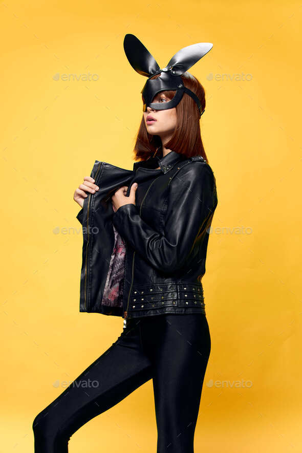 Sexy woman in rabbit mask and black suit, temptation Stock Photo by ...