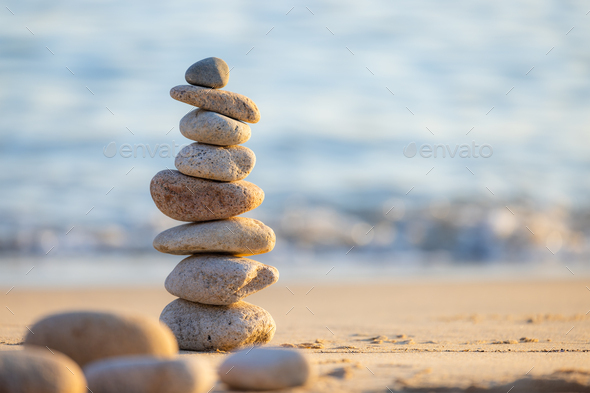Balance pebble stone in the sand beach Stock Photo by leungchopan ...
