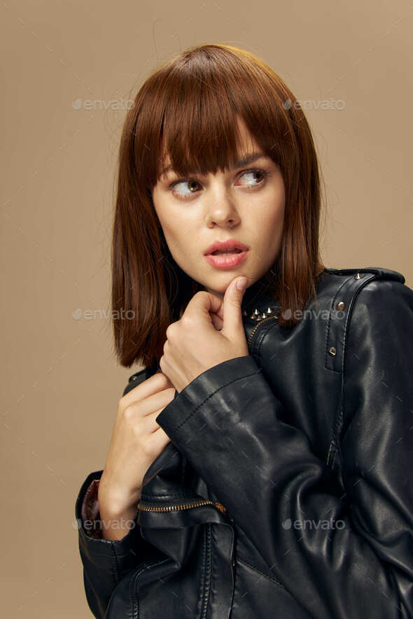 Stylish fashion portrait of a woman with a square in the studio ...