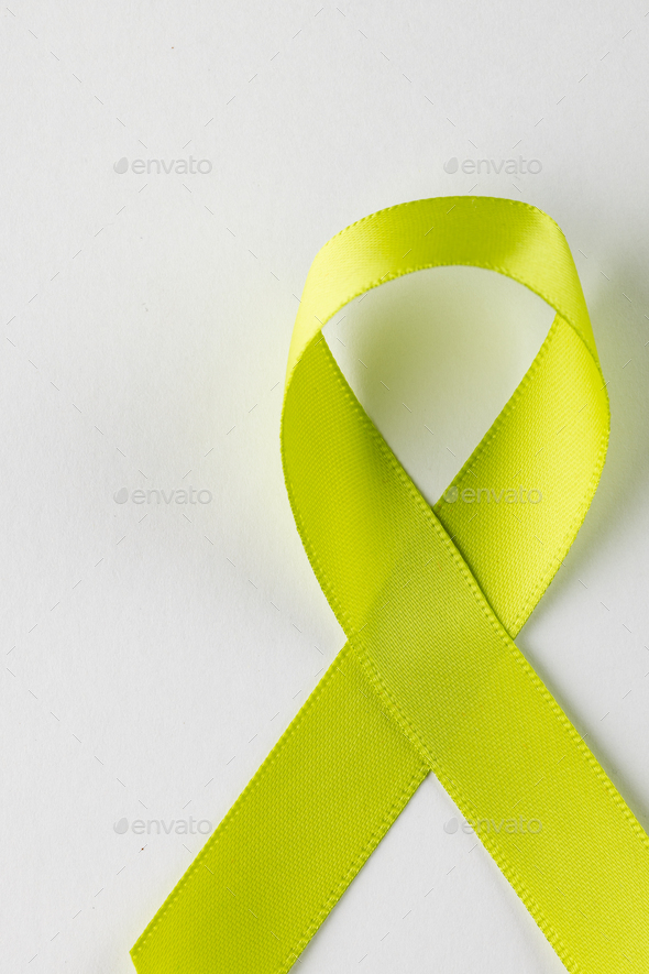 Vertical composition of light green std health awareness ribbon, on ...
