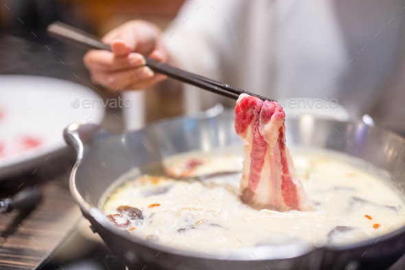 Taiwan spicy duck blood hot pot soup with slice of beef Stock Photo by ...
