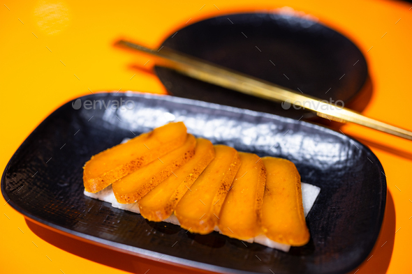Slice of Taiwanese dry mullet roe dish Stock Photo by leungchopan ...