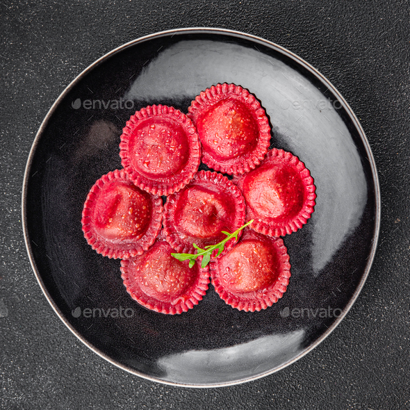 beetroot ravioli beet red pasta in the plate ready to eat appetizer ...