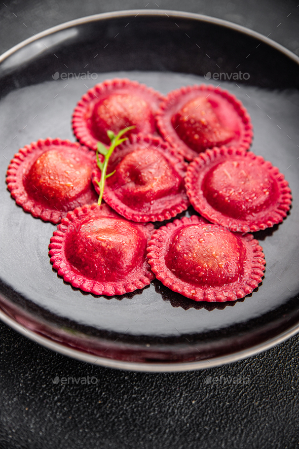 beetroot ravioli beet red pasta in the plate ready to eat appetizer ...