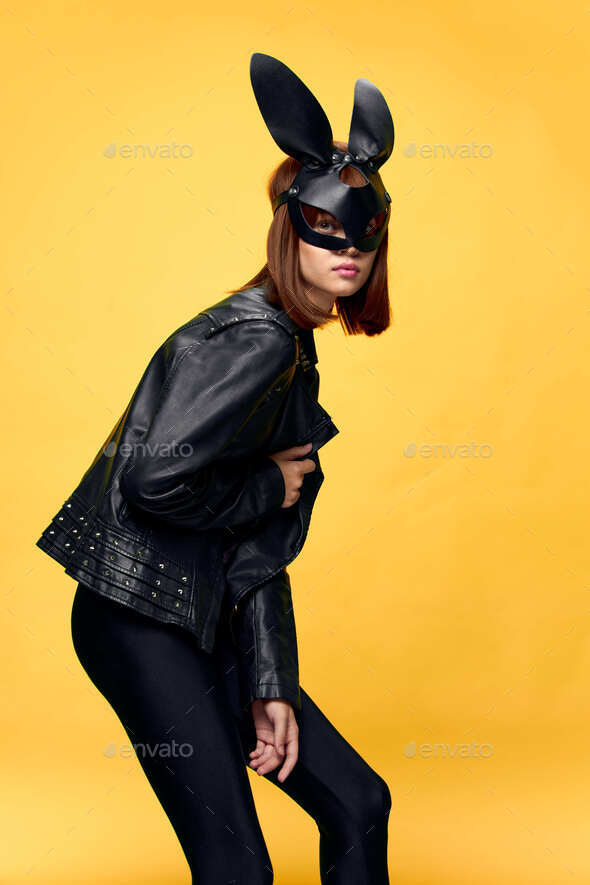 Sexy woman in rabbit mask and black suit, temptation Stock Photo by ...