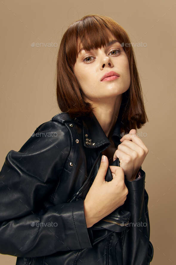 Stylish fashion portrait of a woman with a square in the studio ...