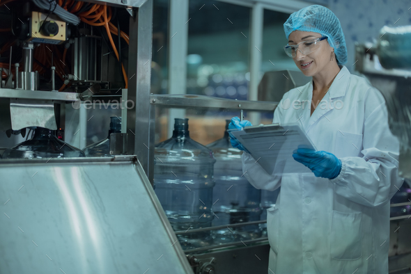 Water production QA specialist monitors and logs conveyor operations for seamless manufacturing ...