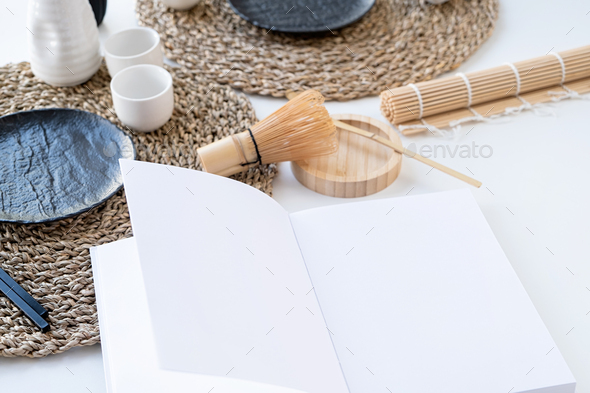 Book mockup design. Blank white book on dining table in asian style ...