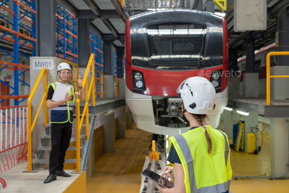 Engineer checks spare parts list and maintains mass transit locomotives ...