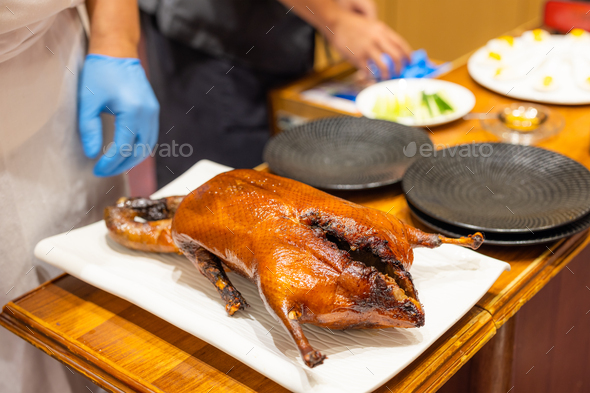 Chef prepare peking duck in restaurant for serving customer Stock Photo ...