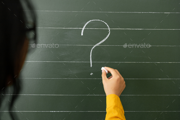 Hand writing question marks on the background of boards. Stock Photo by ...