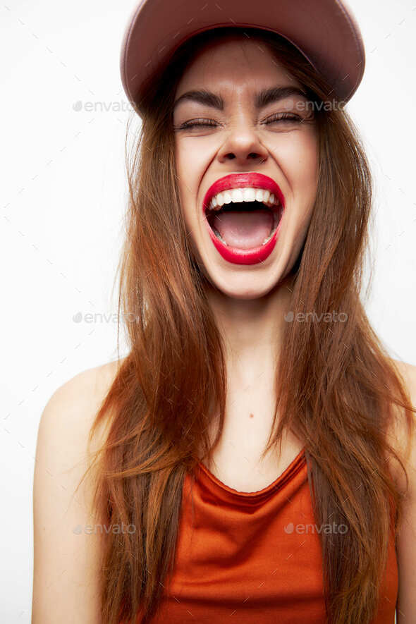 Beautiful woman in a cap Eyes closed model mouth open red lips Stock ...