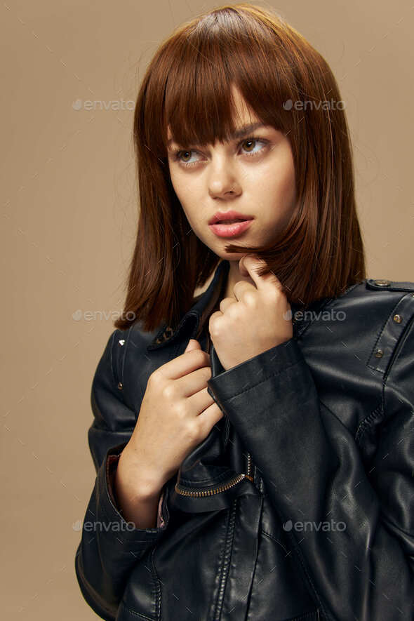 Stylish fashion portrait of a woman with a square in the studio ...