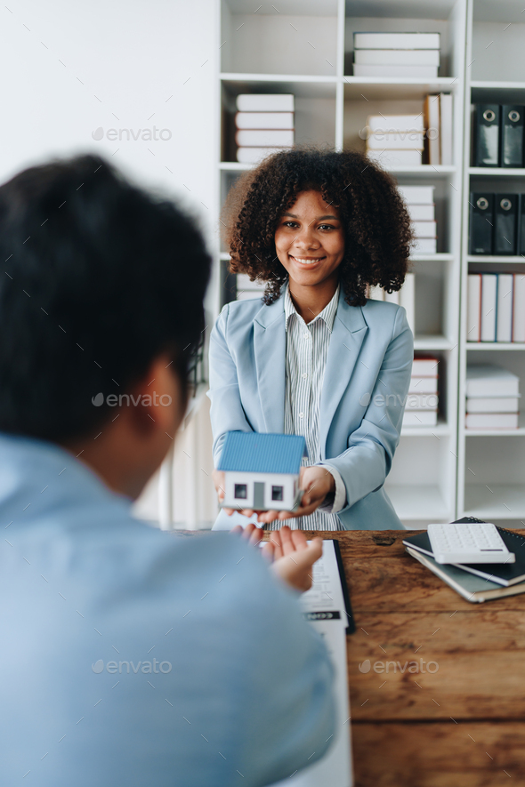 Female African american Real estate company to buy houses and land are ...