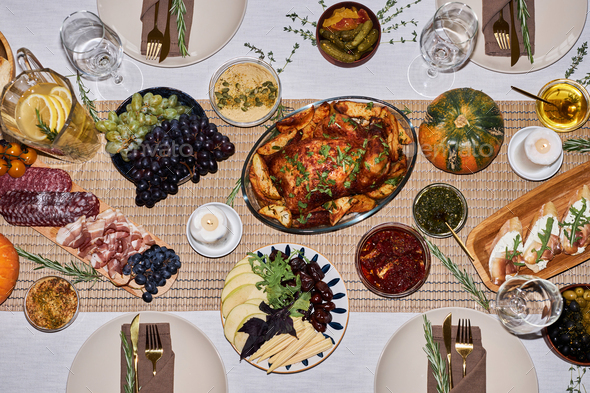 Top view festive dinner table for Thanksgiving with roasted turkey dish ...