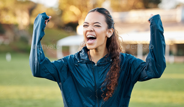 Woman, celebration and winner with excited athlete on a field for sport ...