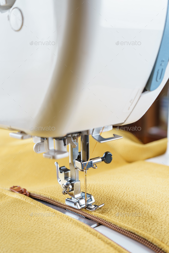 Modern Sewing Machine With Yellow Velours Fabric Close Up Stock Photo ...