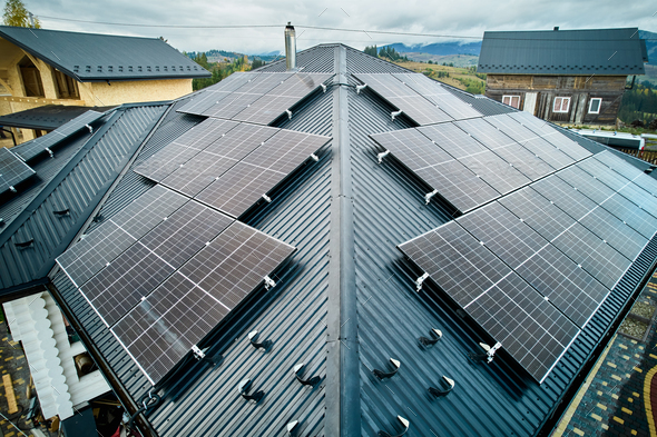 Photovoltaic solar system on the roof Stock Photo by anatoliy_gleb