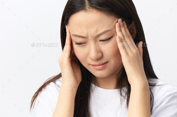 SARS CoVID symptoms. Tormented tanned beautiful young Asian lady touch ...