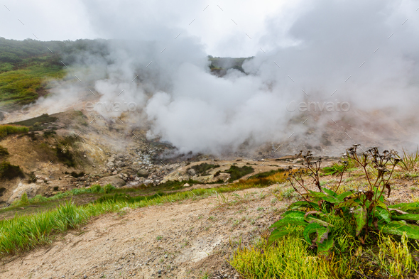 Exciting volcanic landscape, erupting fumarole, hot spring, gas-steam ...