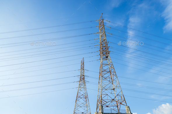 Pylon and high voltage powerline over the blue sky Stock Photo by ...