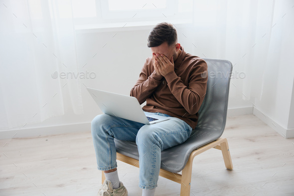 Unexpected error on computer device concept. Crying suffering upset ...