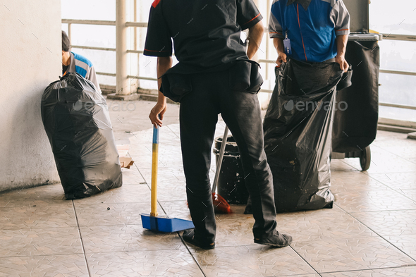 Janitor Cleaning The Area Stock Photo by Garakta-Studio | PhotoDune