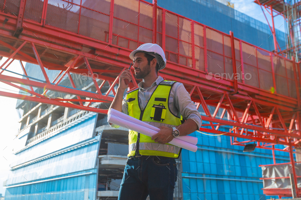 Portrait of an engineer designing a concrete floor and column structure ...