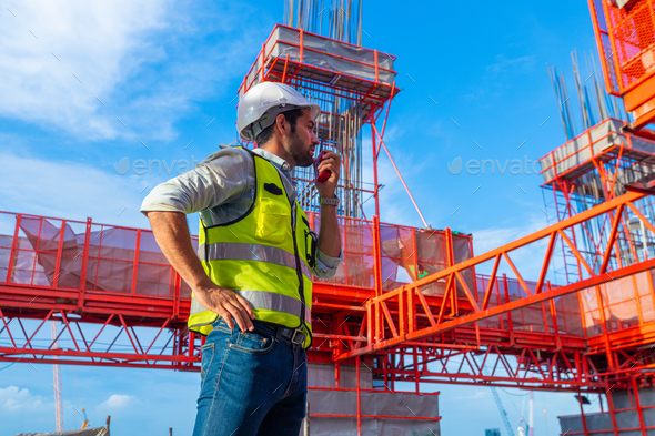 Portrait of an engineer designing a concrete floor and column structure ...