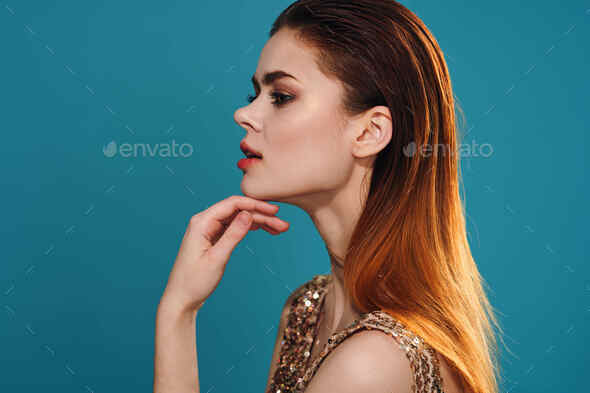 pretty woman in dress side view posing blue background Stock Photo by ...