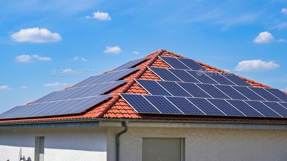 Solar panels on the roof of residential buildings. Sustainable ...