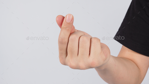 Male model is doing mini heart hand sign. Stock Photo by puibunny ...