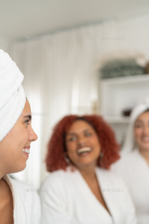 Women and worker in a beauty spa smiling and chatting Stock Photo by ...