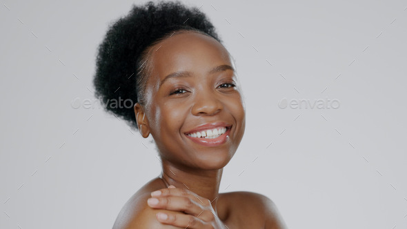 Face, skincare and beauty of happy black woman in studio isolated on a gray background mockup ...
