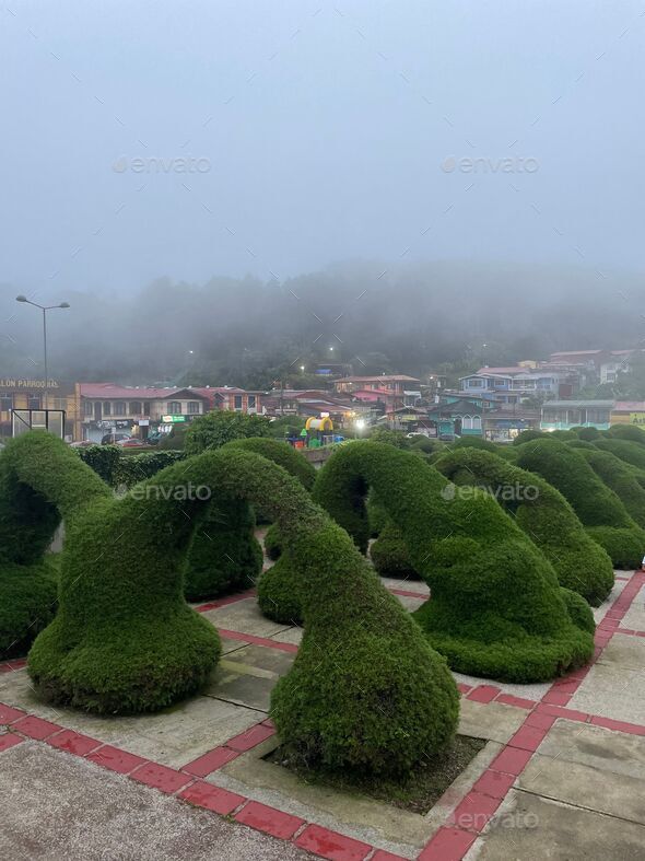 Vertical shot of topiary arches in Parque Francisco Alvarado in Zarcero ...
