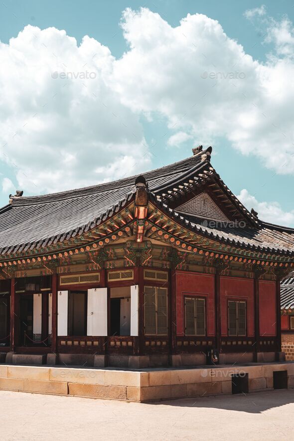 Vertical shot of a traditional Korean building under the sunlight and a ...