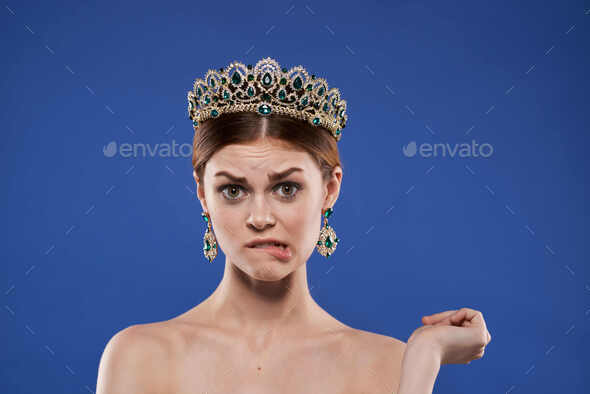 Princess with a crown on her head makeup model hand gesture isolated ...