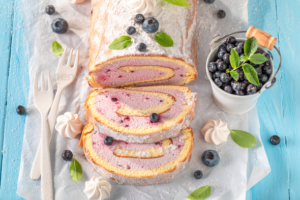 Homemade blueberry swiss roulade made of berry fruits. Stock Photo by ...