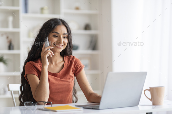 Multitasking Young Indian Woman Engaged with Technology Tools Stock ...