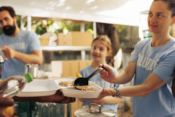 Food drive: Helping poor and needy people Stock Photo by DC_Studio