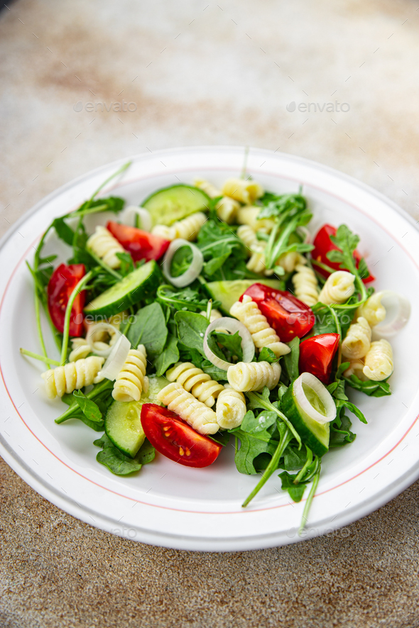 pasta salad fusilli pasta, cucumber, tomato, green lettuce, onion ...