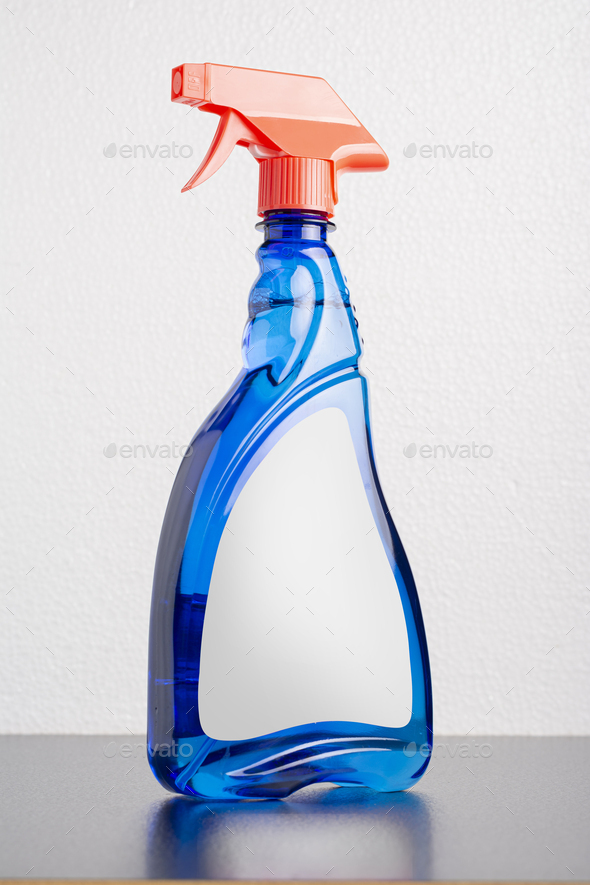 Cleaning liquid bottle in front of light gray background mock-up series ...