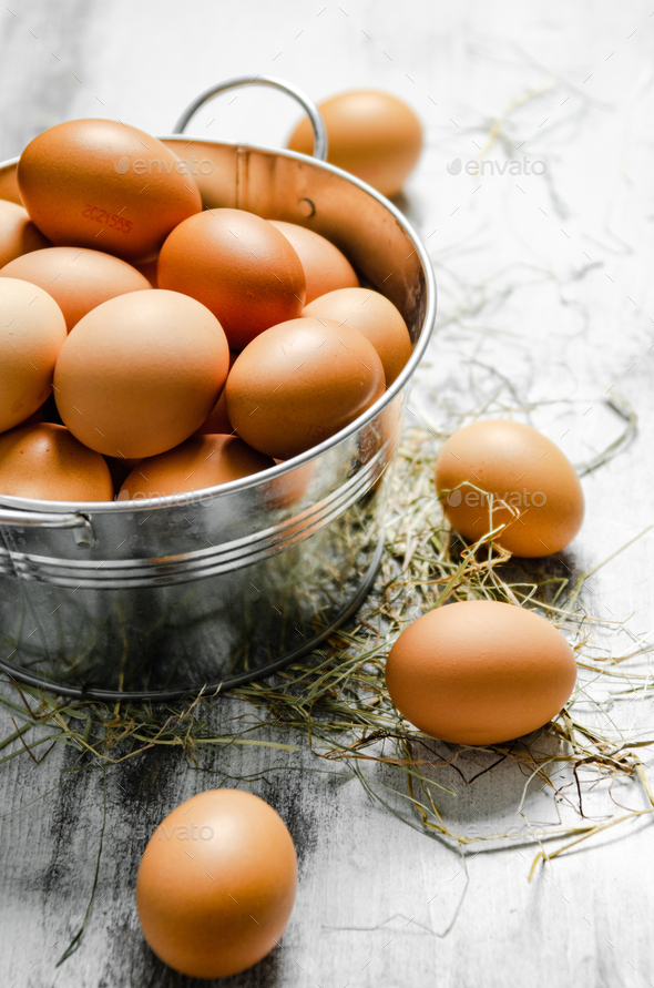 Fresh chicken eggs in bucket. Stock Photo by Artem_ka2 | PhotoDune